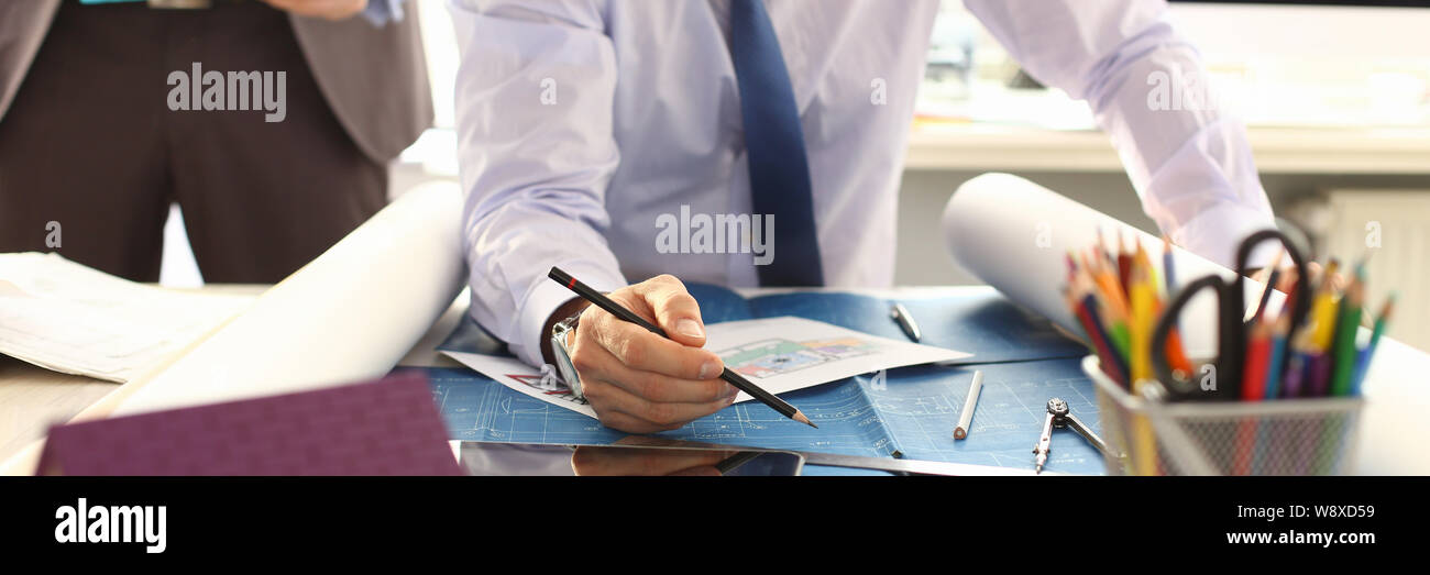 Male Architector Working on Construction Project Stock Photo - Alamy