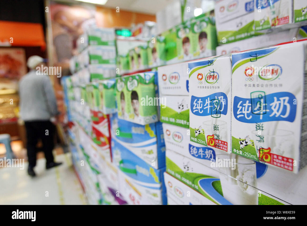 --FILE--Cartons of Yili pure milk are for sale at a supermarket in ...