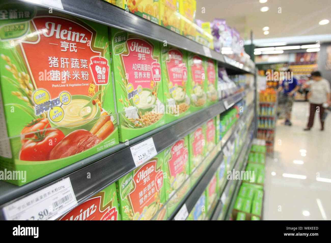 --FILE--Cartons of Heinz pork liver & vegetables cereal and AD Calcium ...