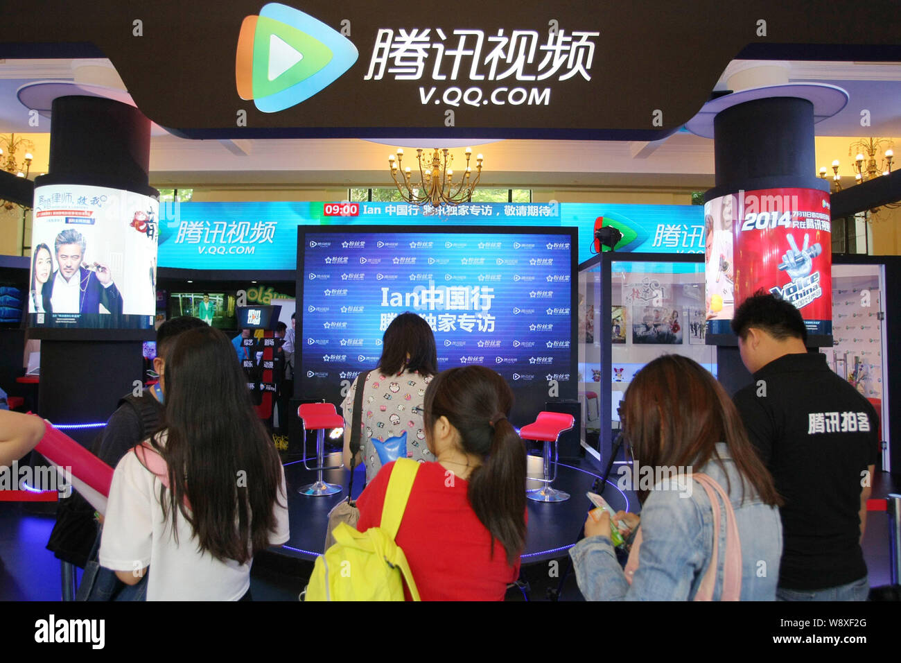 --FILE--People visit the stand of v.qq.com of Tencent during an ...