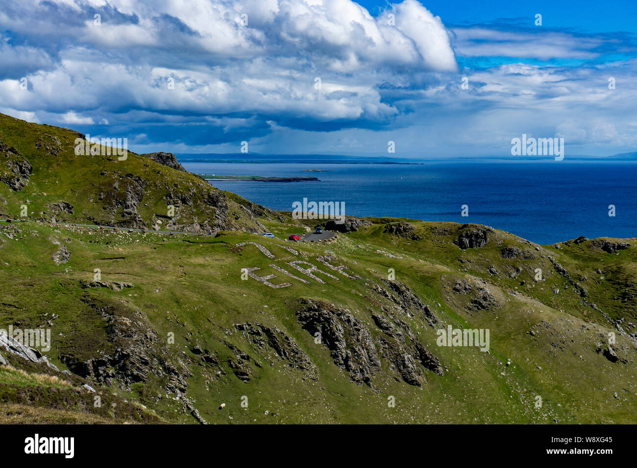 ocean cliffs in northern ireland, with write 71 eire Stock Photo - Alamy