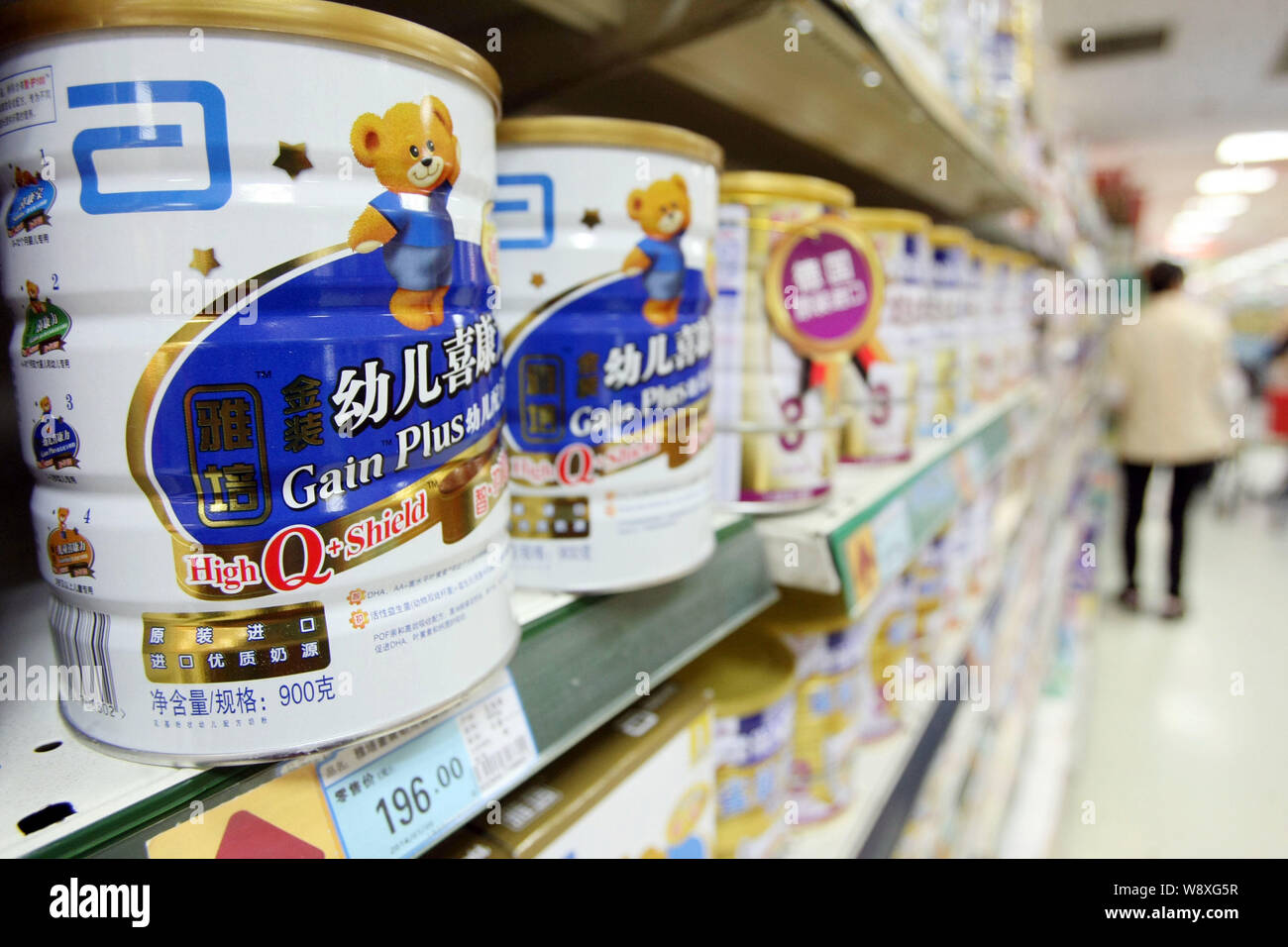 Tins of Abbott baby formula are for sale at a supermarket in Shanghai ...