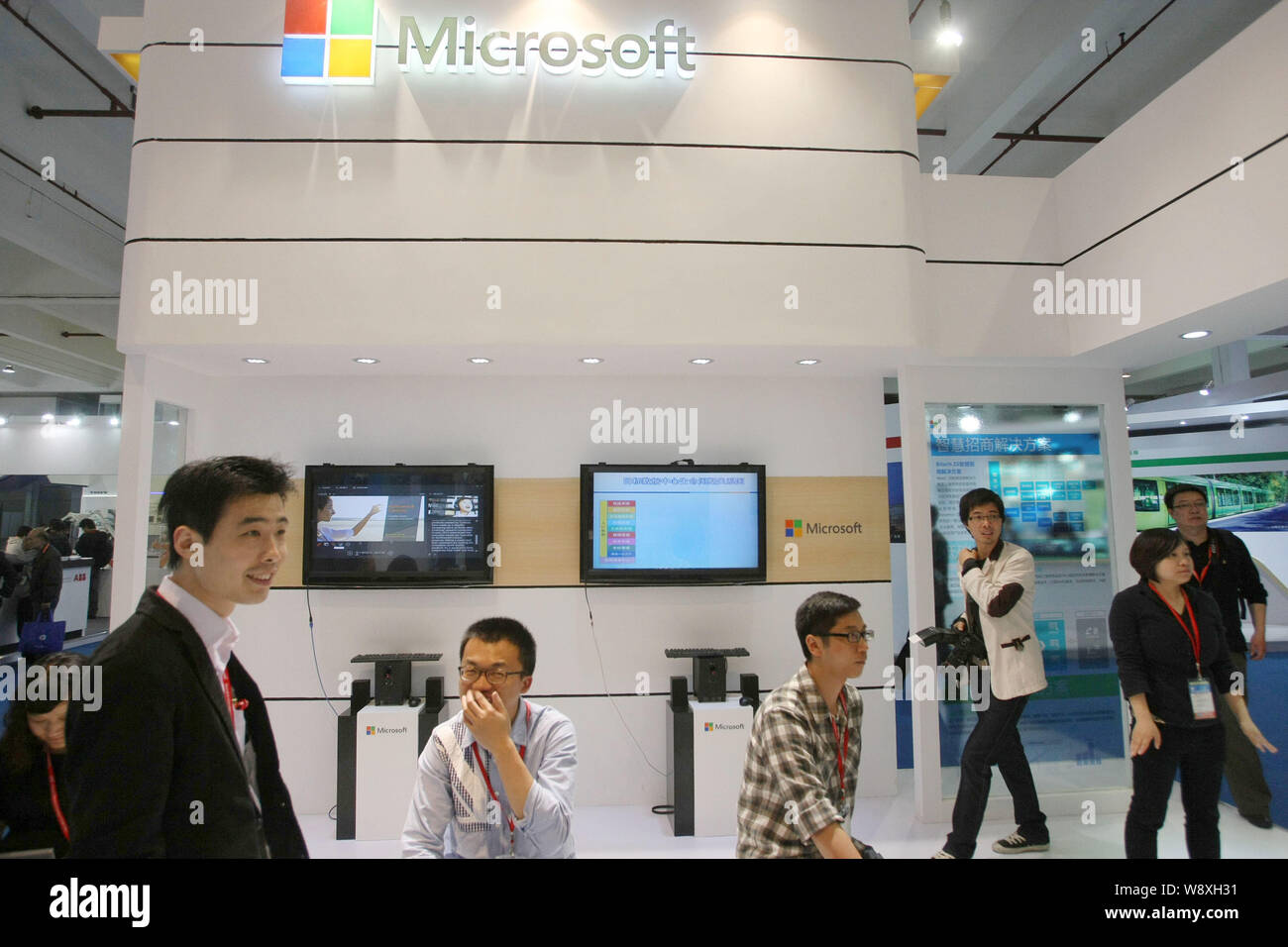--FILE--People visit the stand of Microsoft during the 1st China ...
