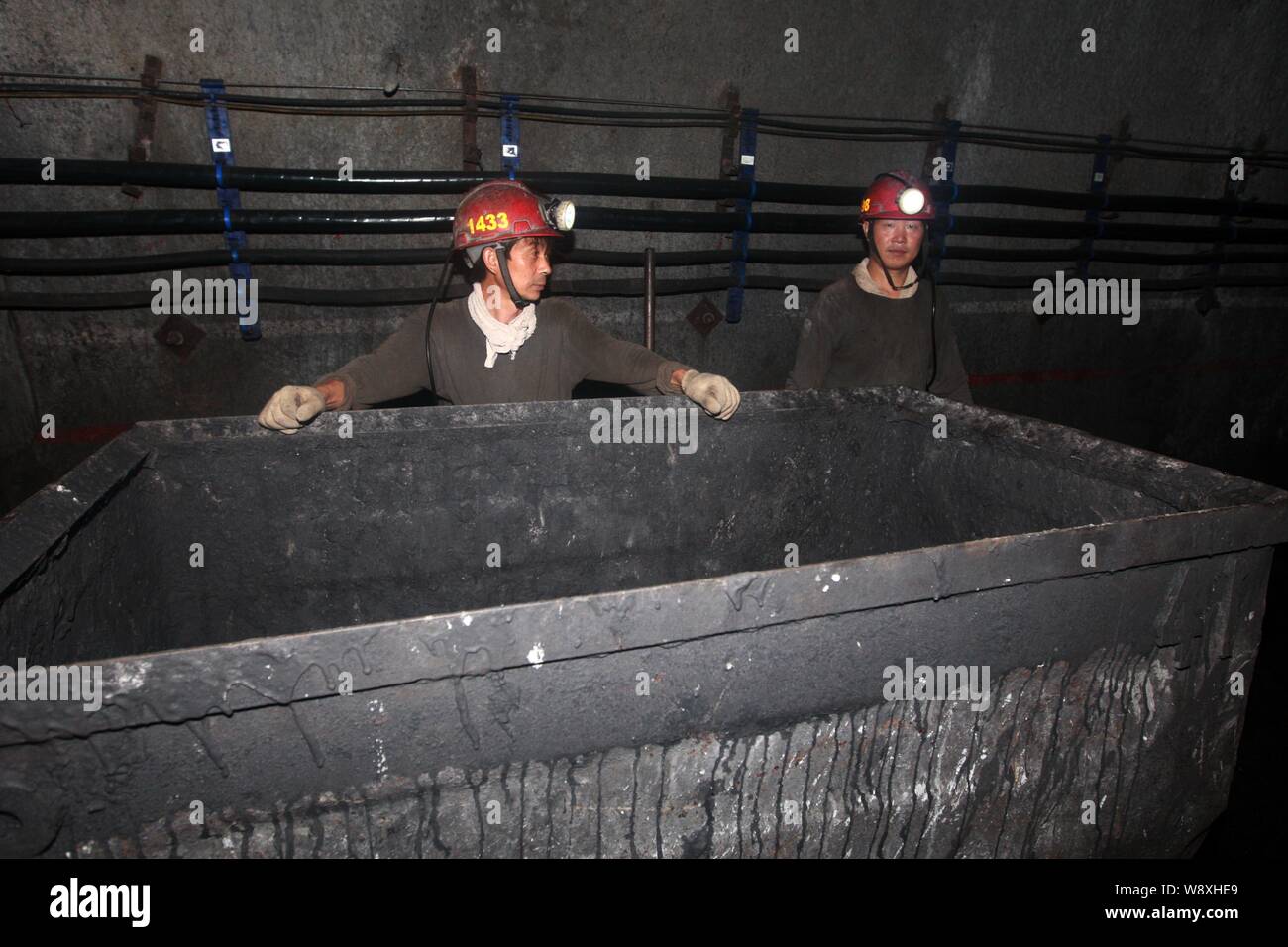 --FILE--Chinese miners work underground at Daihe coal mine in Huaibei ...