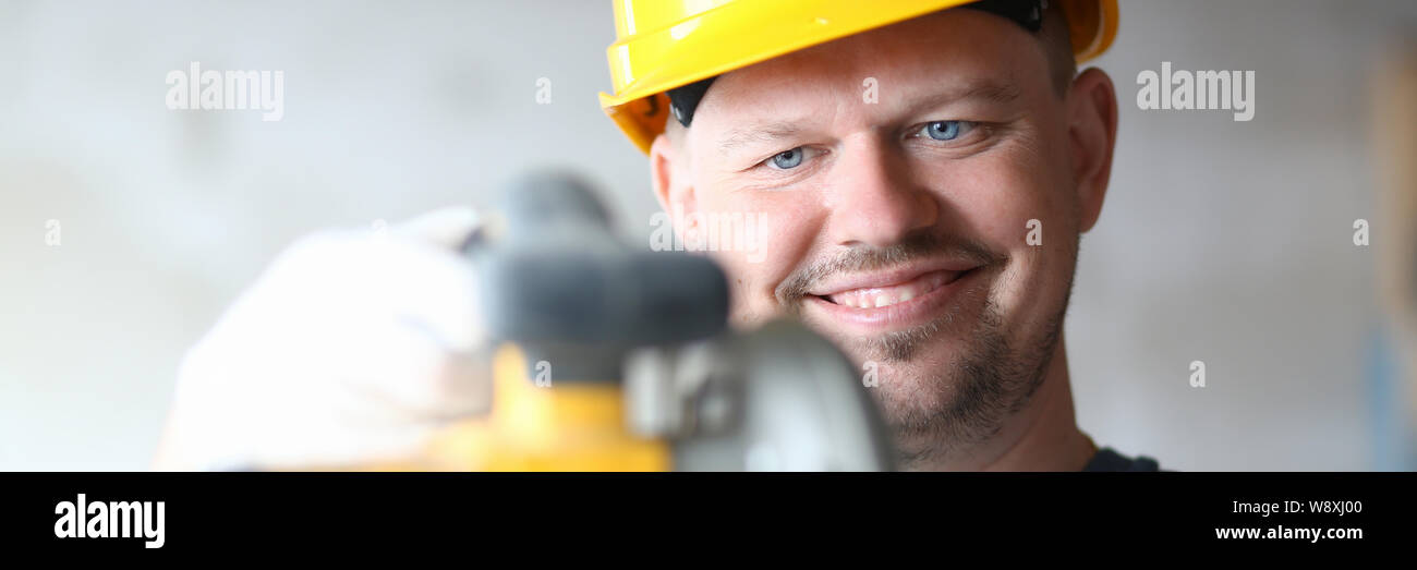 Happy man and new tool Stock Photo - Alamy