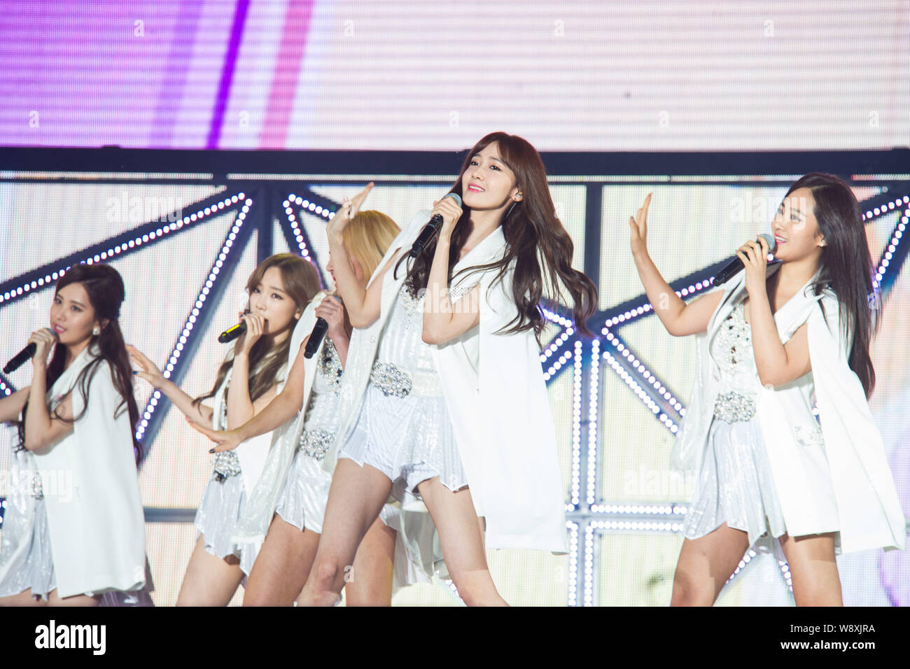 Members of South Korean girl group Girl's Generation perform at the ...