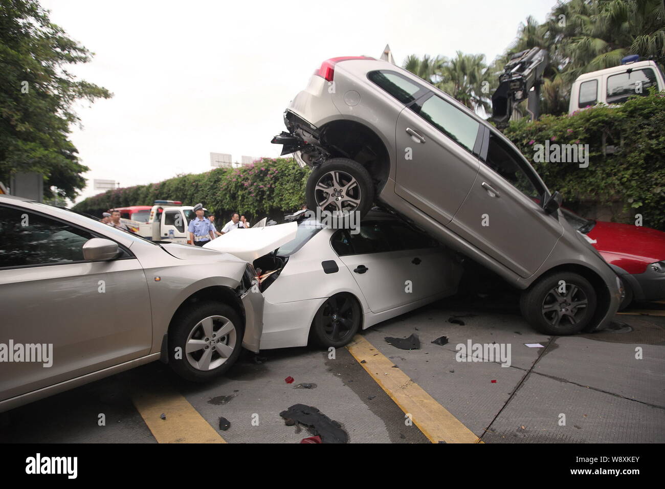 Cars stack up after a collision caused by a truck on Nigangxi Road in ...