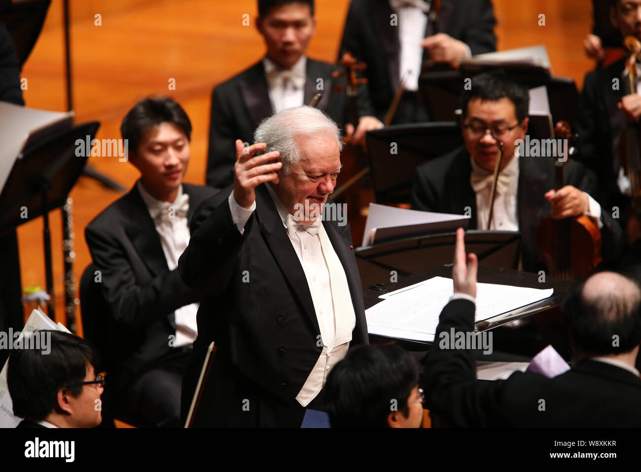 French conductor Philippe Entremont, center, performs at the opening ...