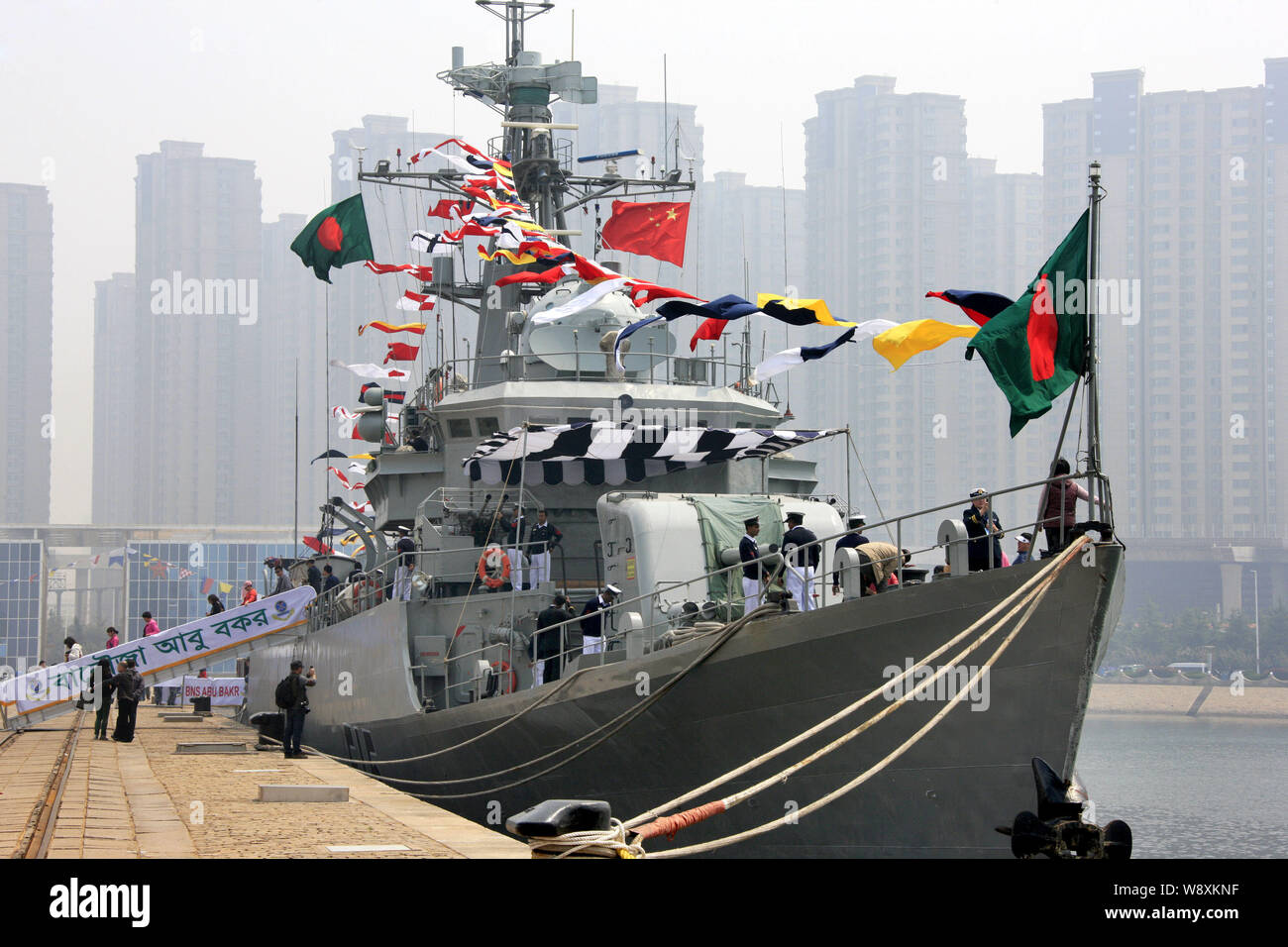 People visit the BNS Abu Bakar frigate of the Bangladesh Navy at a port ...