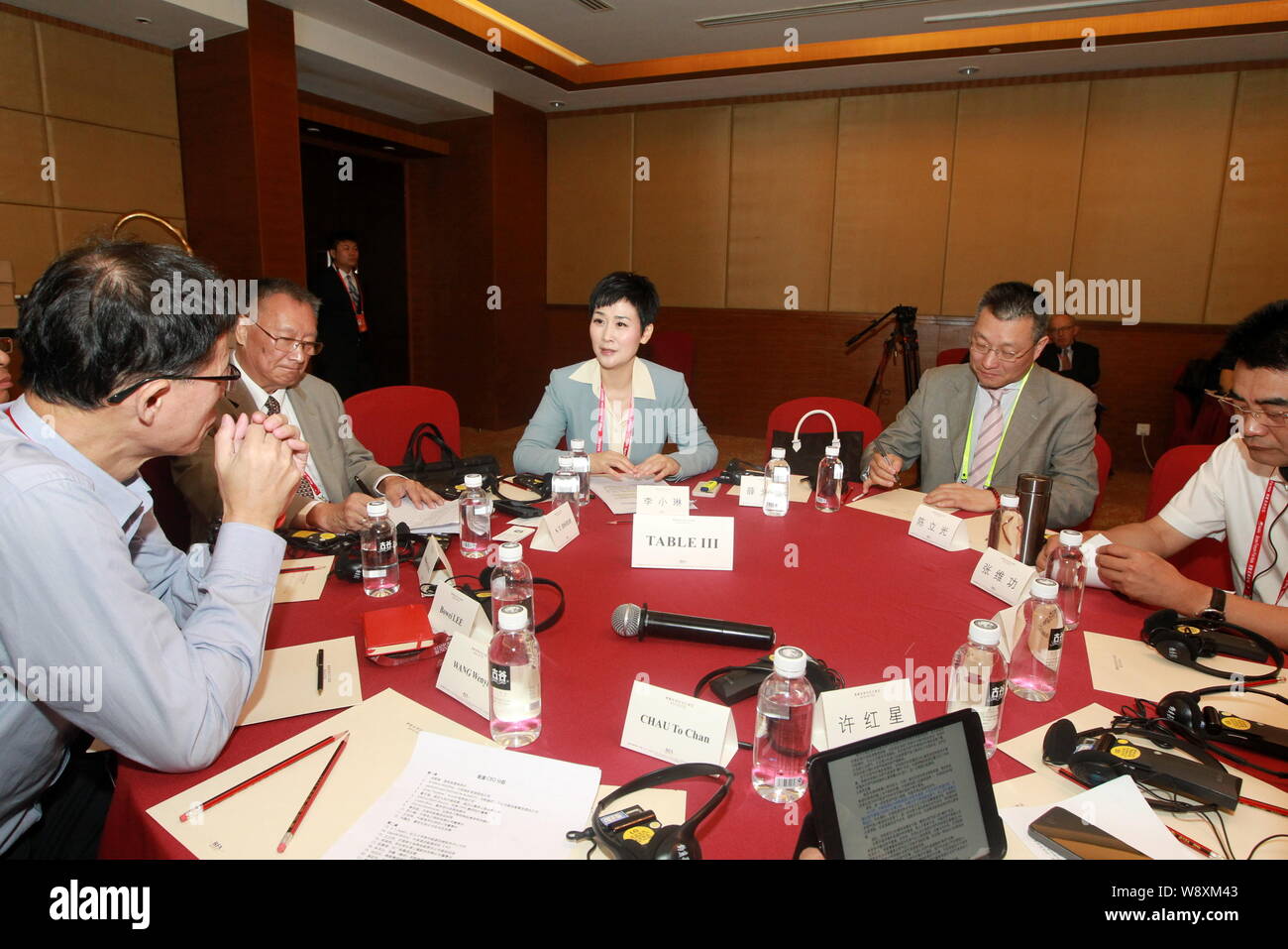 Li Xiaolin, center, Chairwoman and CEO of China Power International ...