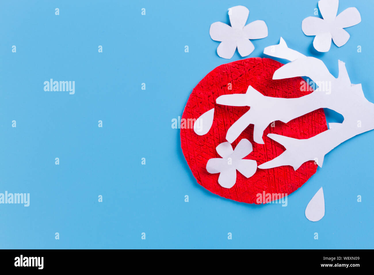 Paper art of Japan flag and sakura Stock Photo - Alamy