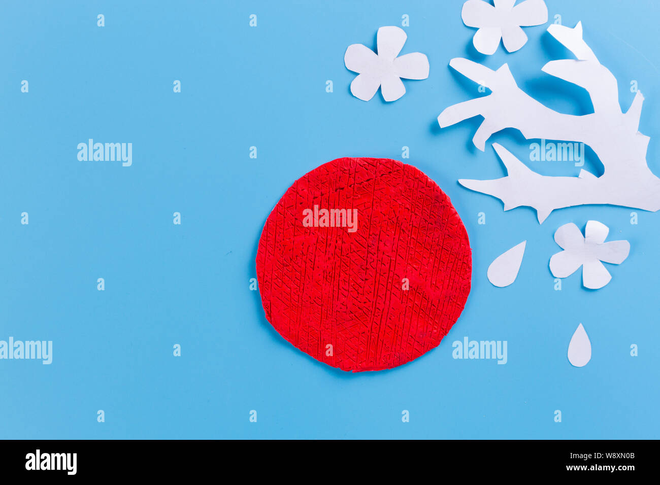 Paper art of Japan flag and sakura Stock Photo - Alamy