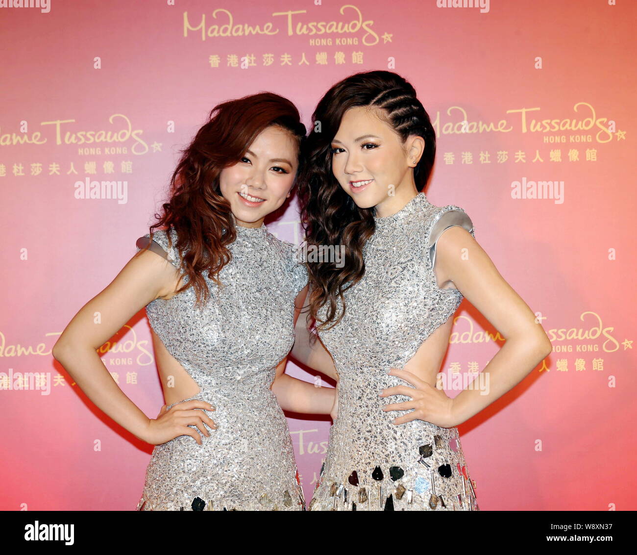 Hong Kong singer Gloria Tang Tsz-kei, left, better known by her stage ...