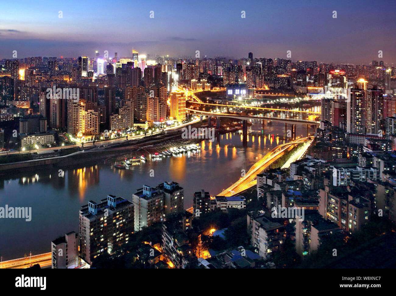 --FILE--The Jiangling River Bridge and the YuAo Bridge are seen over ...