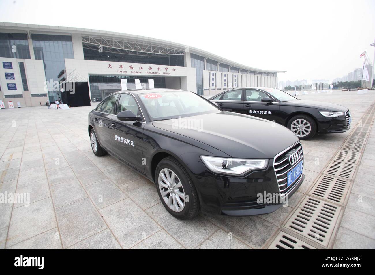 New Audi A8L limousines are seen on display outside the Tianjin ...