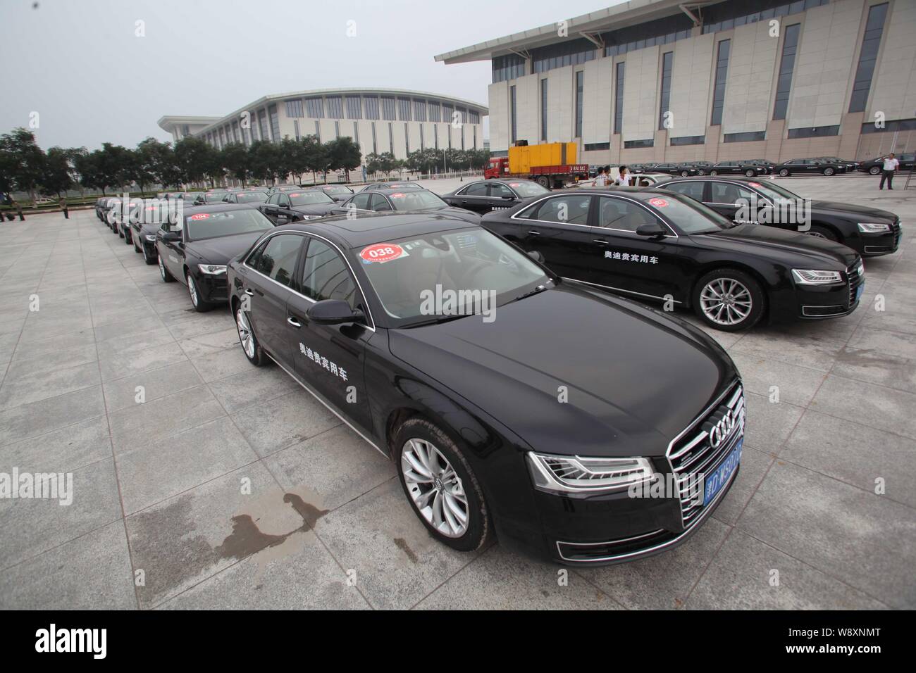 New Audi A8L limousines are seen on display outside the Tianjin ...