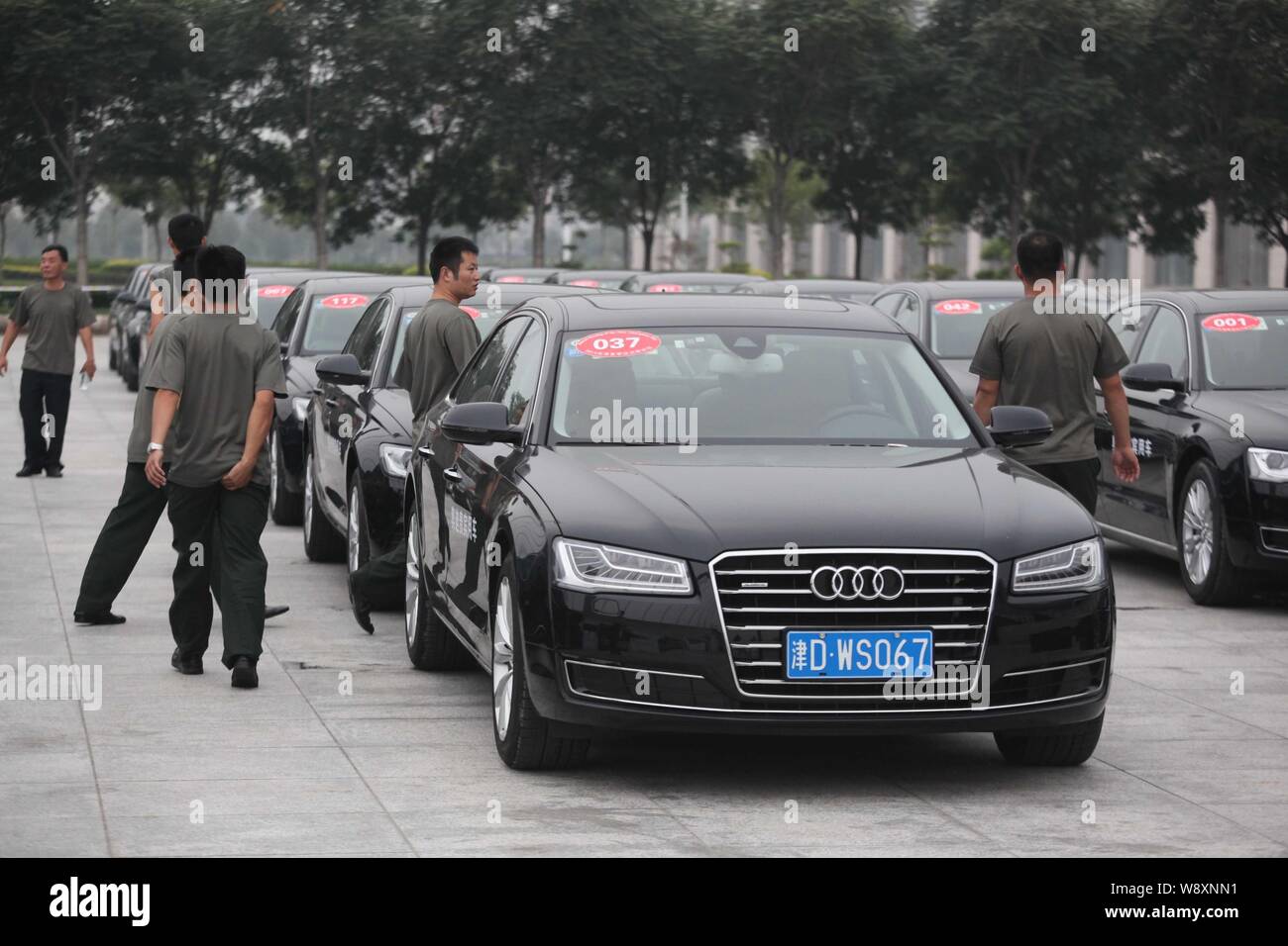 New Audi A8L limousines are seen on display outside the Tianjin ...