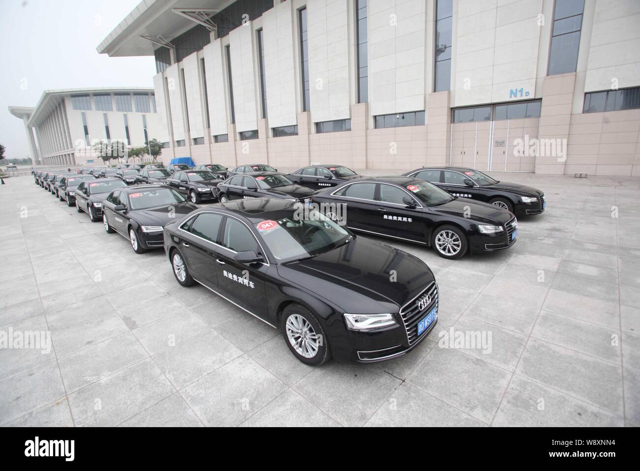 New Audi A8L limousines are seen on display outside the Tianjin ...