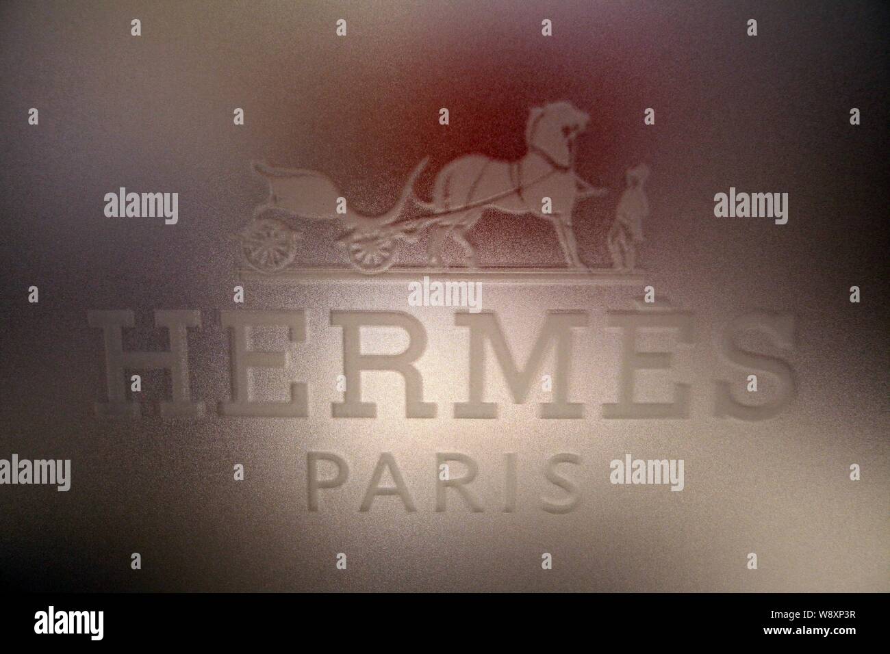--FILE--A signage of Hermes is pictured at a boutique of Hermes at a ...