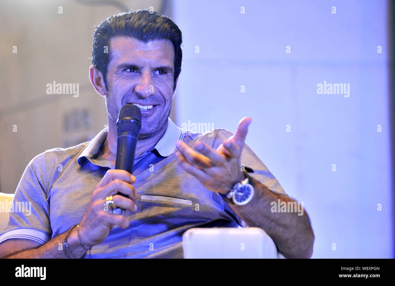 Portuguese football star Luis Figo speaks during a fans meeting at a ...