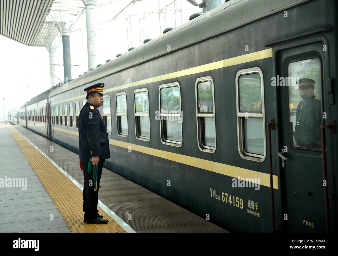 Chinese train conductor hi-res stock photography and images - Alamy
