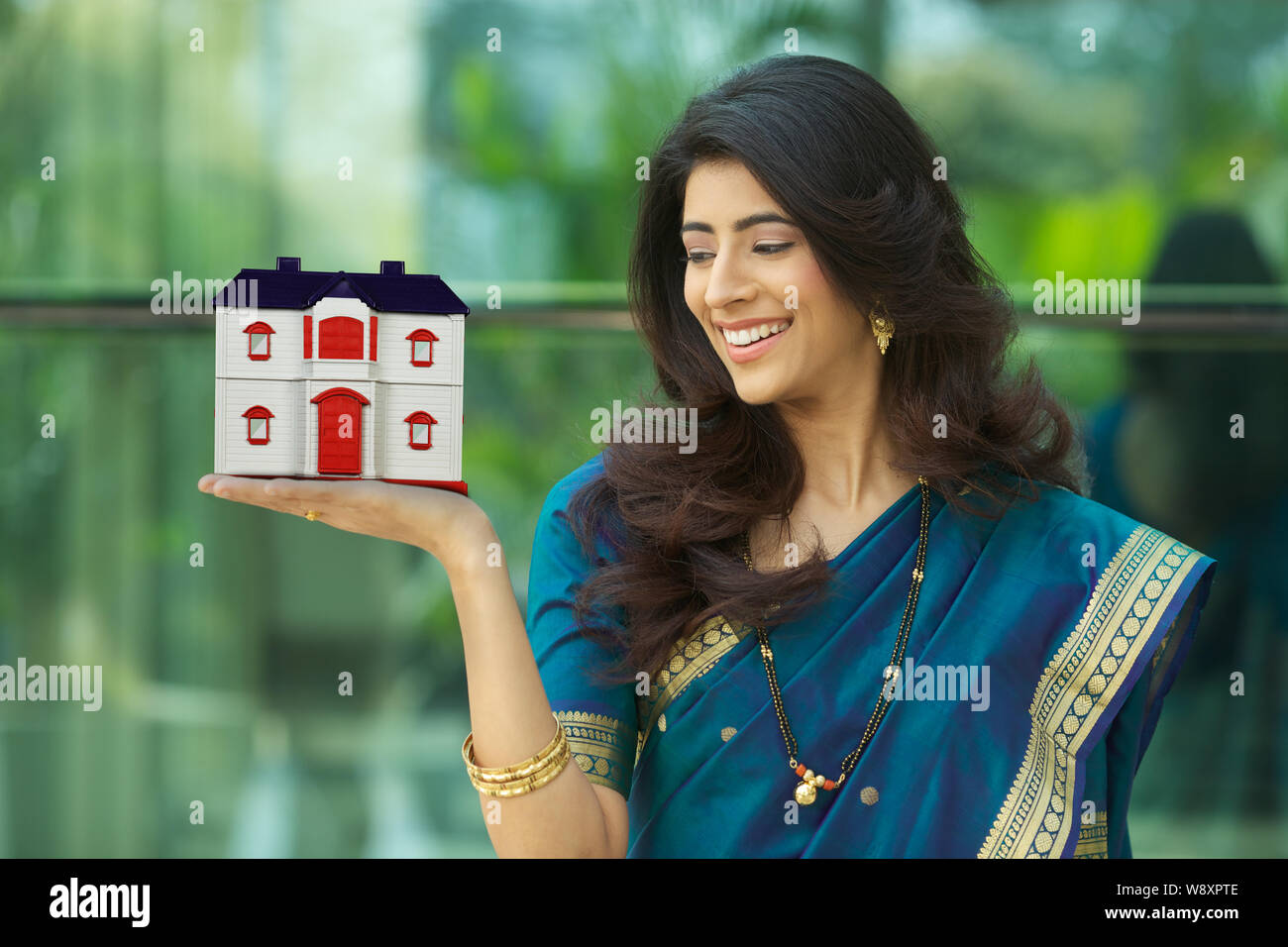 Beautiful woman smiling home hi-res stock photography and images - Alamy