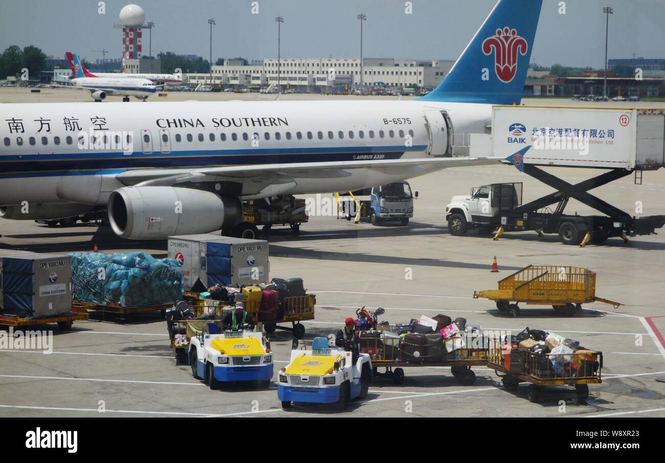 --FILE--A passenger jet plane of China Southern is parked at the ...