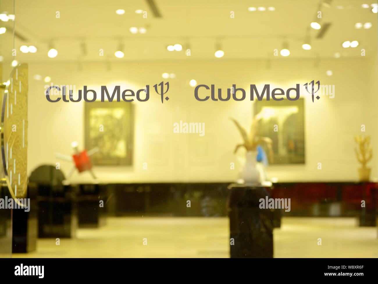 --FILE--The logo of Club Med is seen on glass at Club Med Guilin resort ...