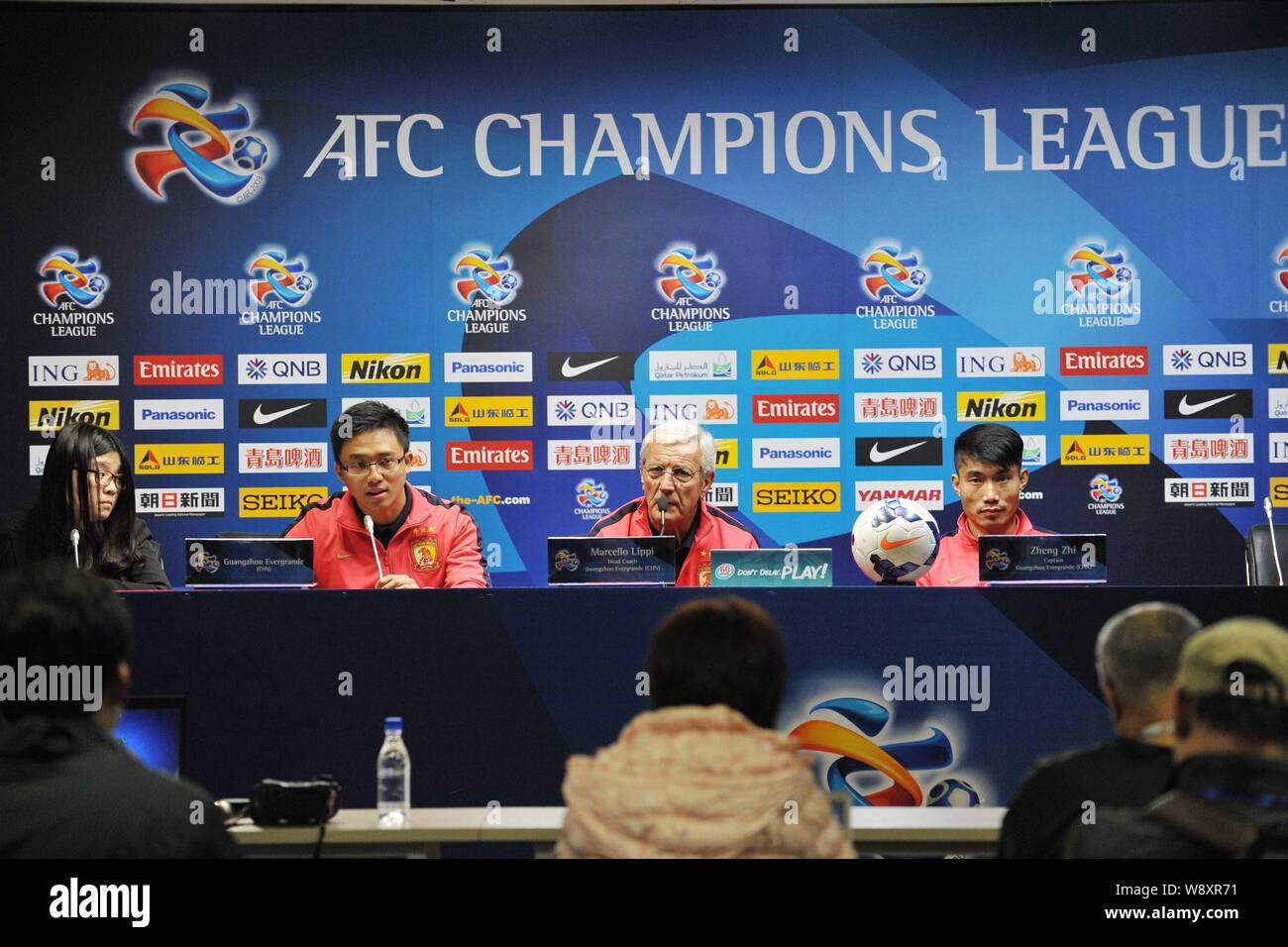 Italian soccer coach Marcello Lippi, second right, and captain Zheng ...