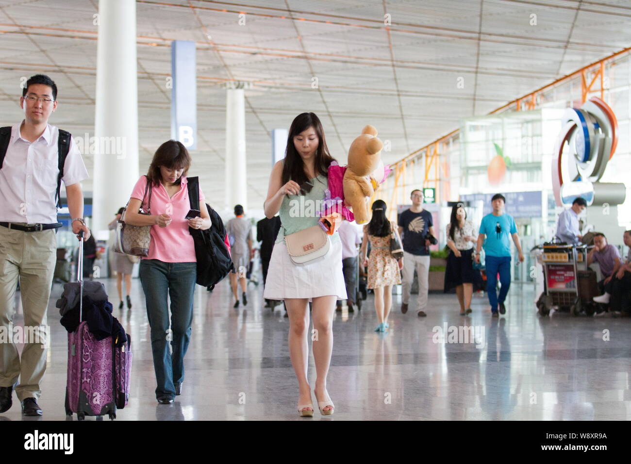 American table tennis player Ariel Hsing, front right, walks with her ...