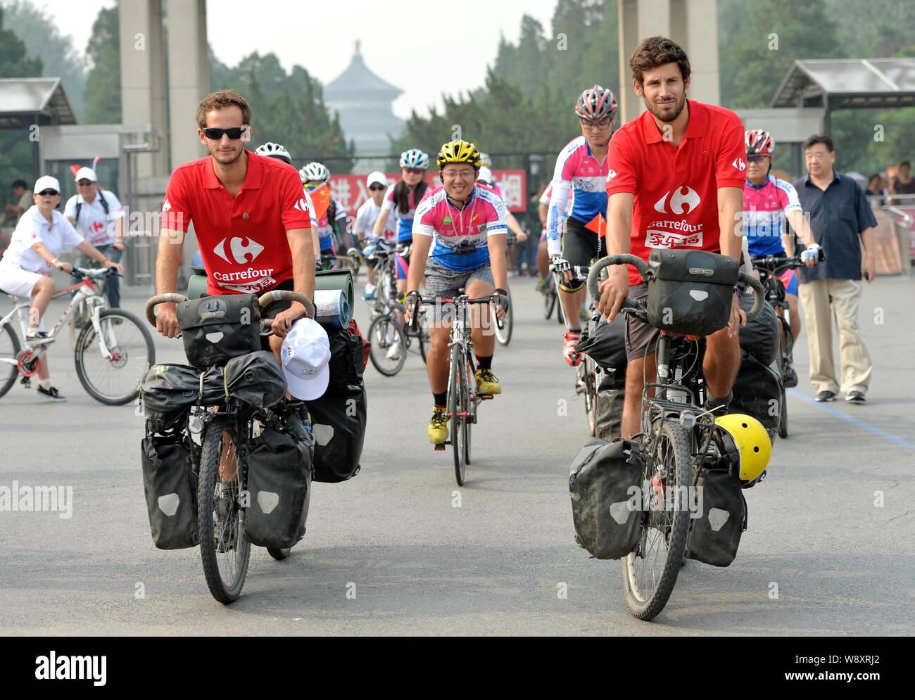 French cyclists Basile Pottier, left, and Simon Poniard, right, pedal ...