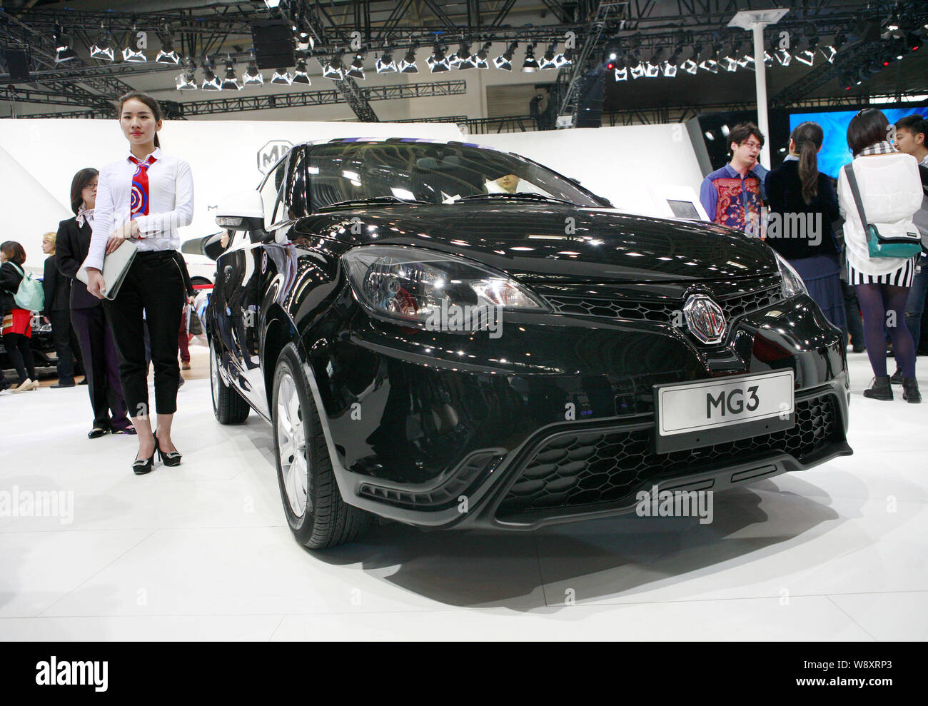 --FILE--Visitors view a MG 3 of SAIC Motor during the 13th Beijing ...