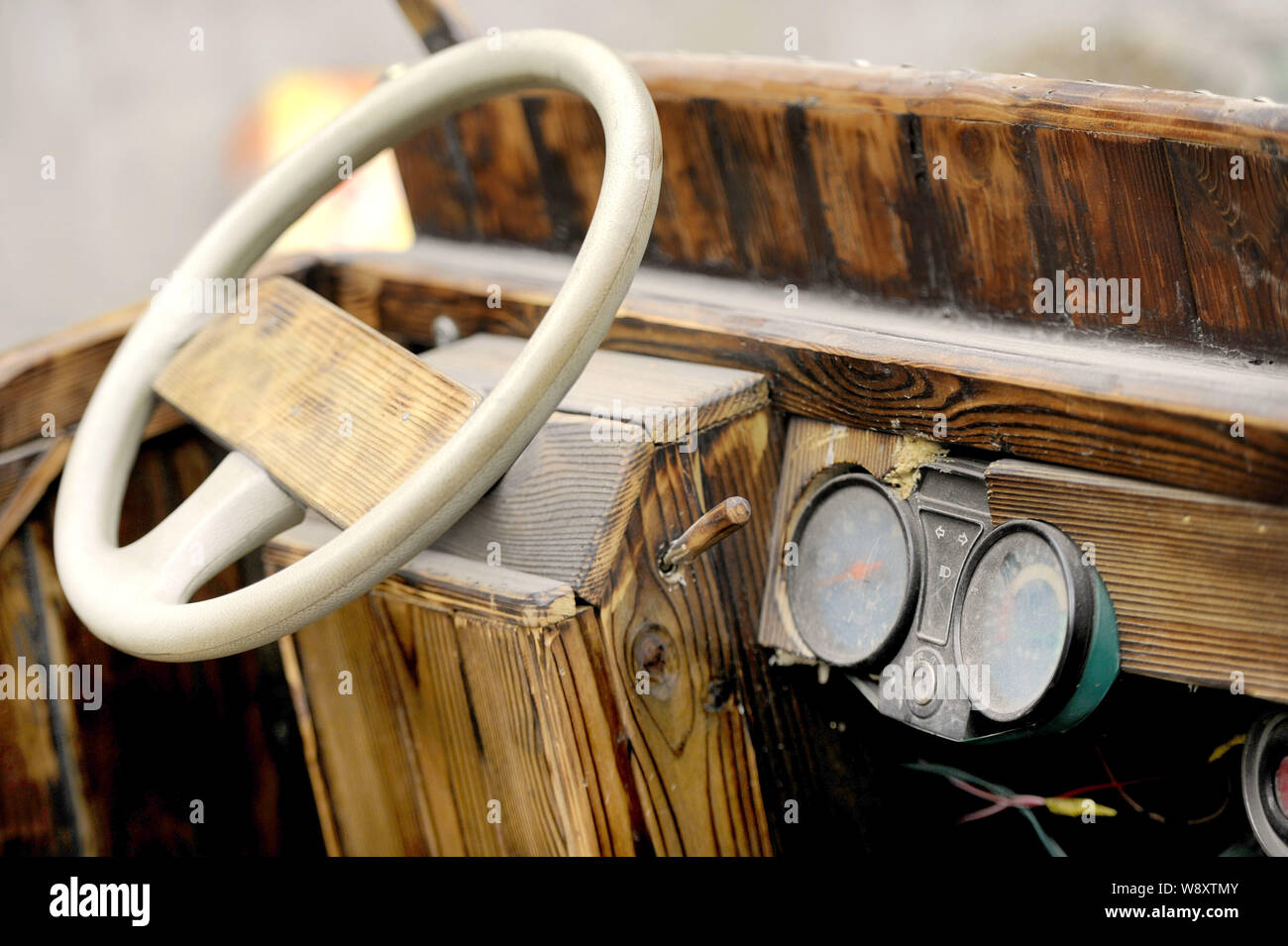 The driving wheel and the dashboard are seen in Chinese carpenter Liu ...
