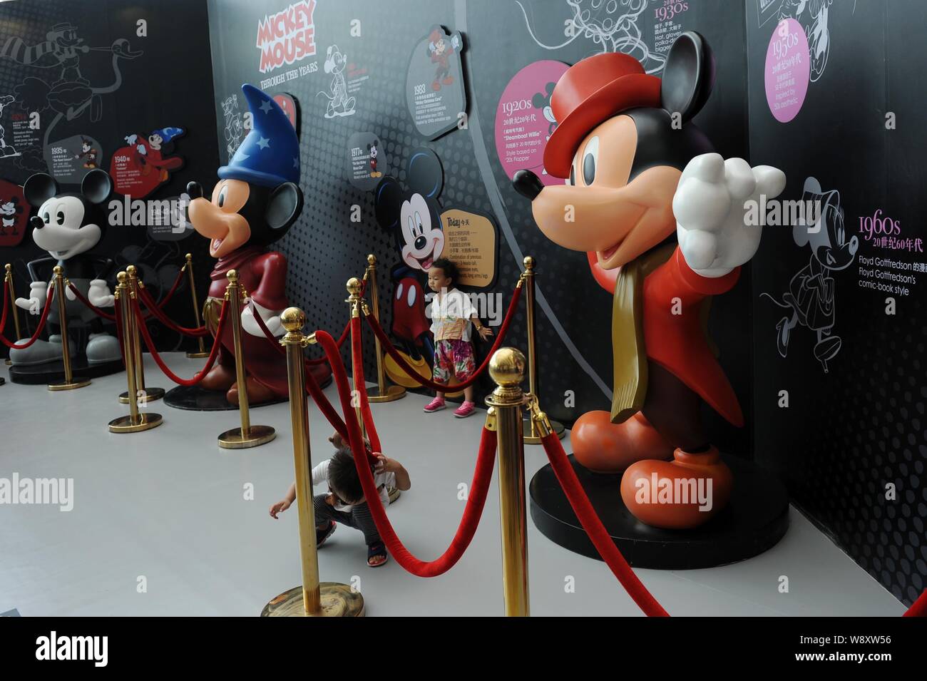 Statues of Disney figure Mickey Mouse are seen on display during the ...