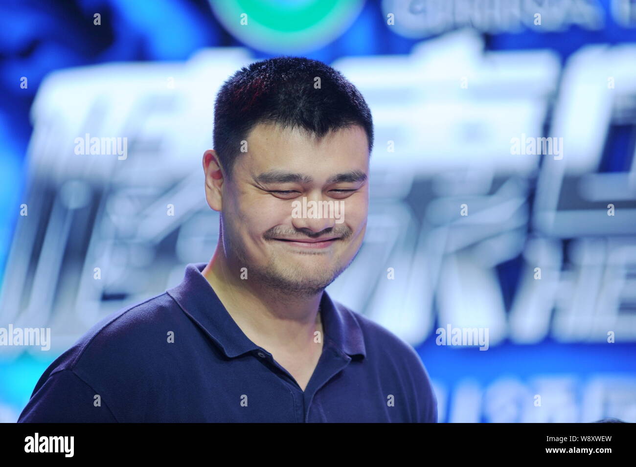 Retired Chinese basketball star Yao Ming smiles during an episode of TV ...