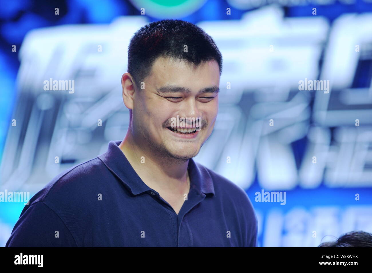 Retired Chinese basketball star Yao Ming smiles during an episode of TV ...