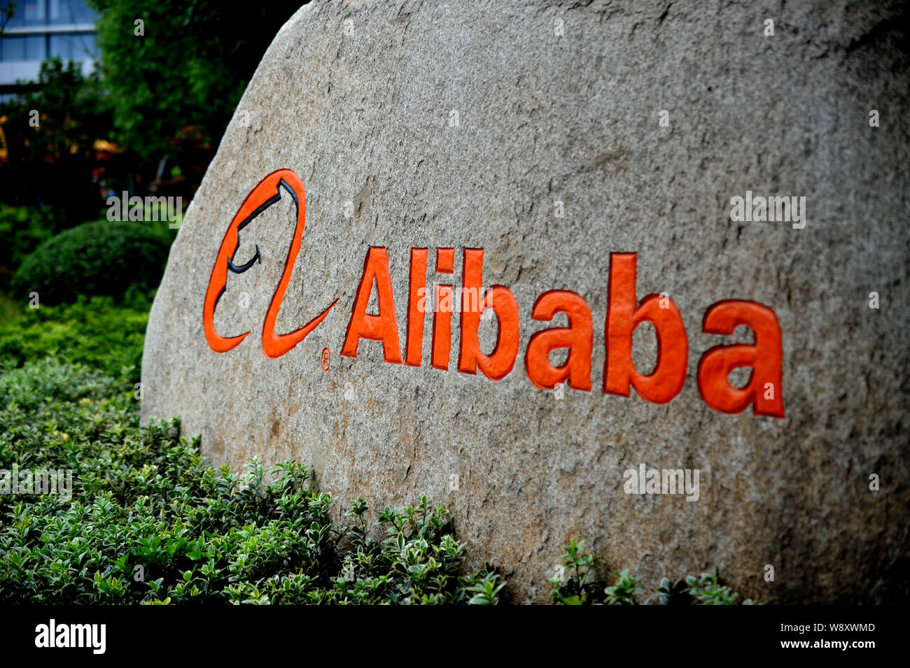 A signage of Alibaba is seen in front of Alibaba Group's headquarters ...