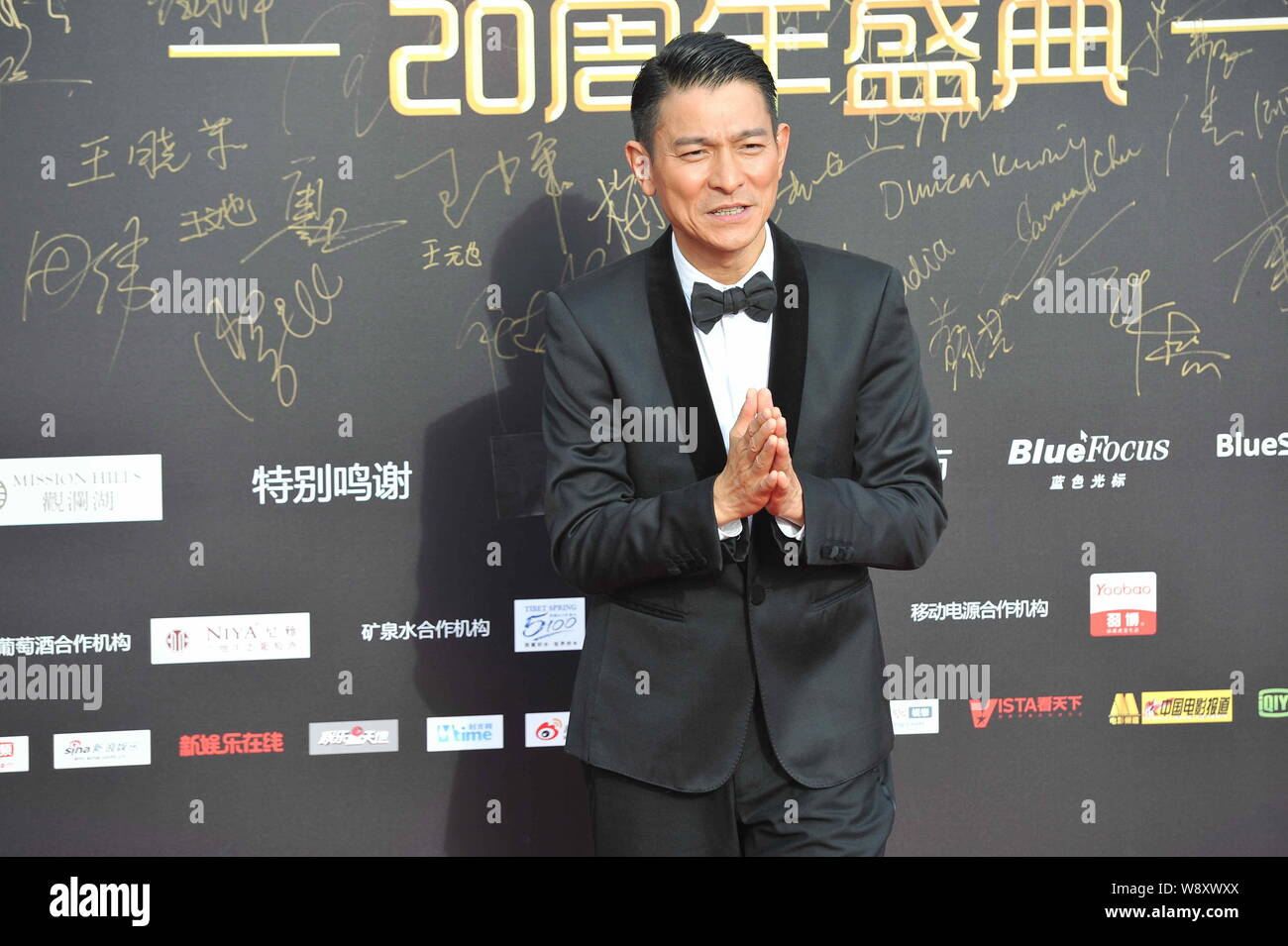 Hong Kong singer and actor Andy Lau poses on the red carpet of the ...