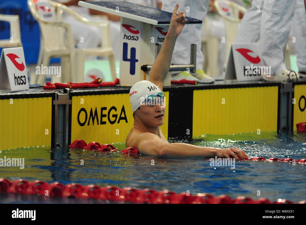 --FILE--Sun Yang of China poses after winning in the 1500m freestyle ...