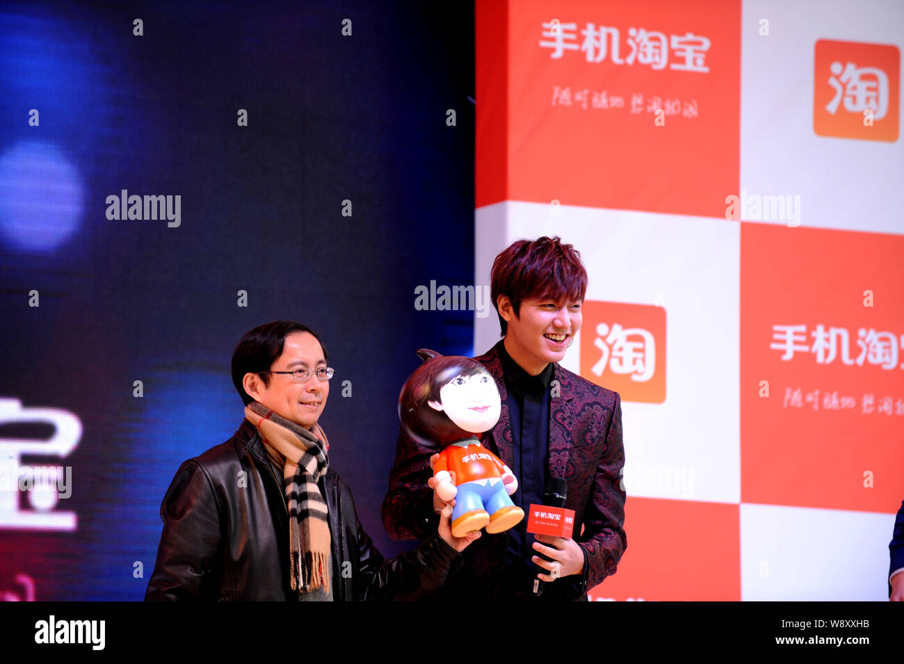 South Korean actor Lee Min-ho, right, poses with Zhang Yong, CEO of ...