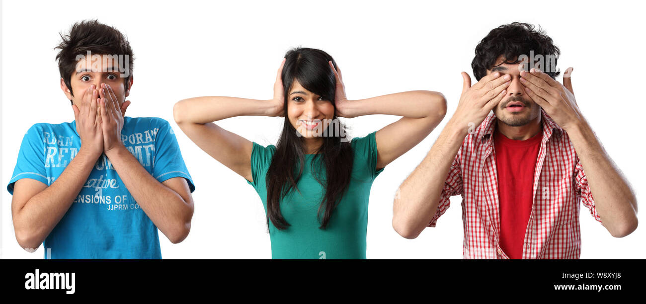 Friends doing see no evil, hear no evil, speak no evil gesture Stock ...