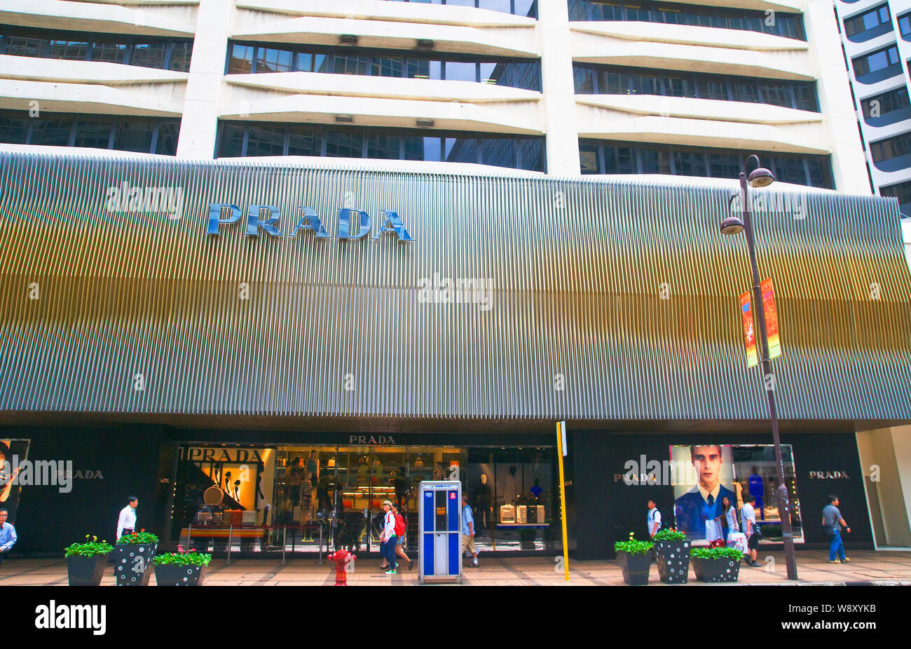 --FILE--Pedestrians walk past a boutique of Prada in Hong Kong, China ...