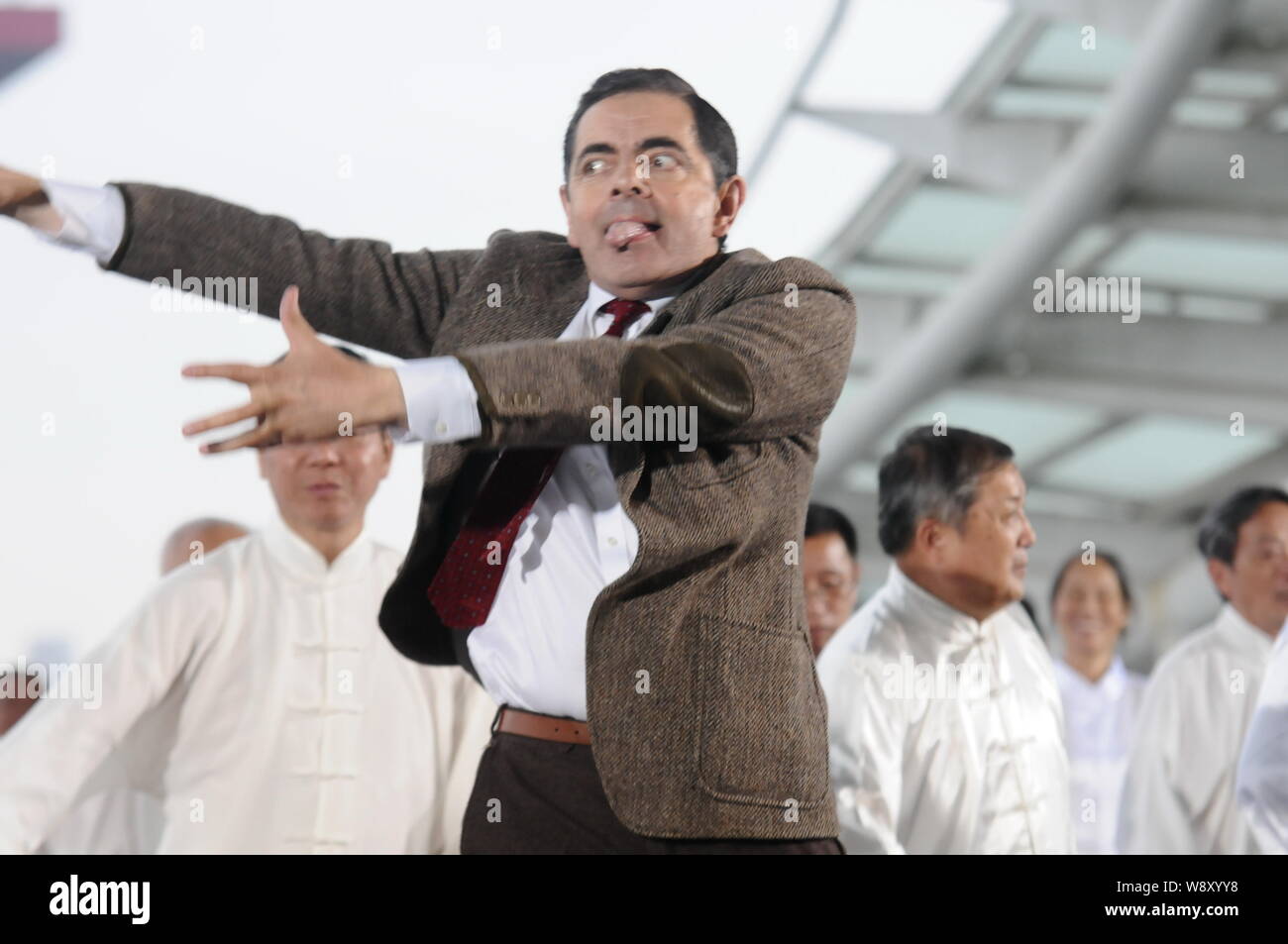 English actor Rowan Atkinson, front, plays Mr. Bean during a filming ...