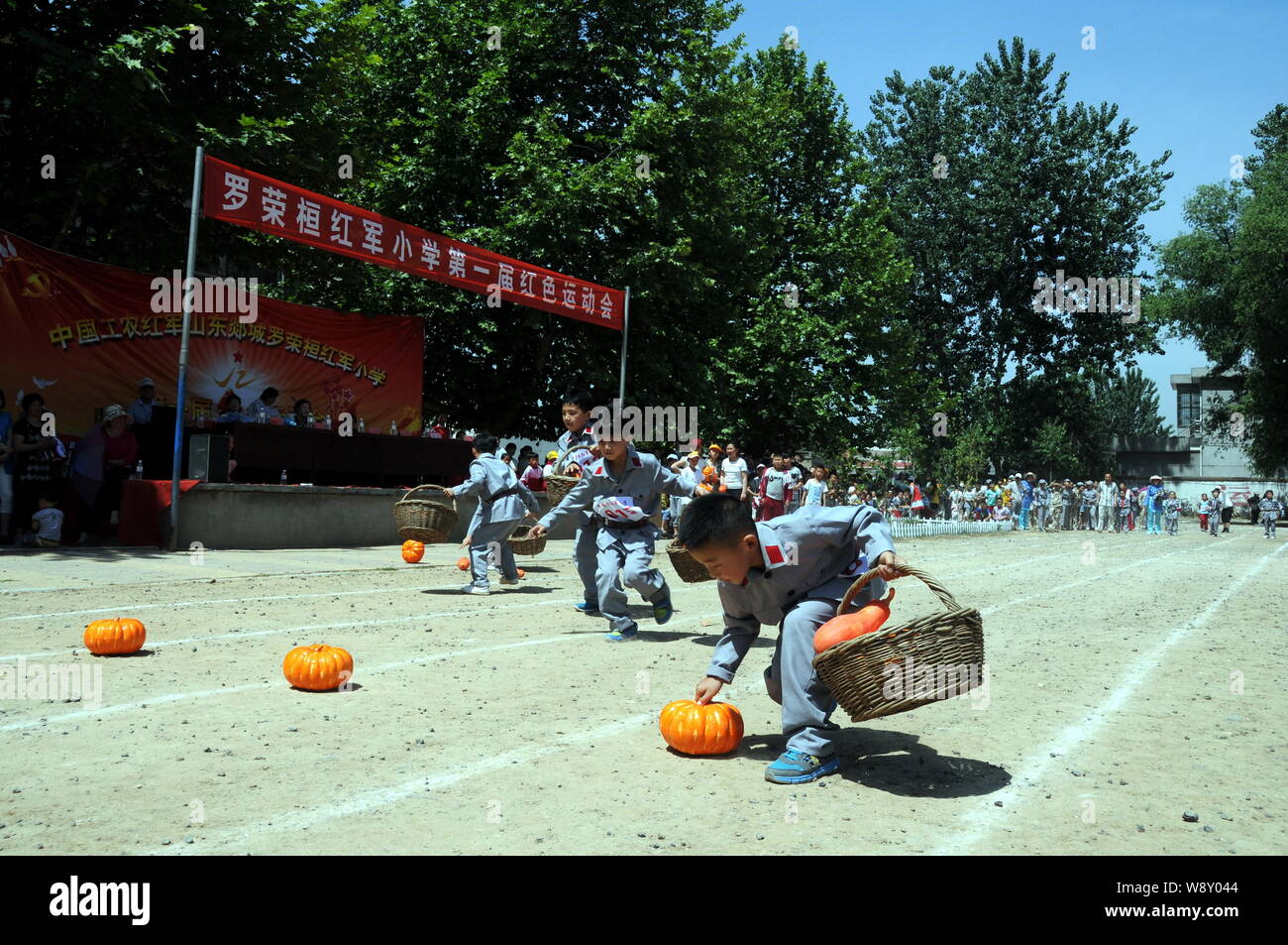 Young pupils dressed in Red Army uniforms compete in a race named ...