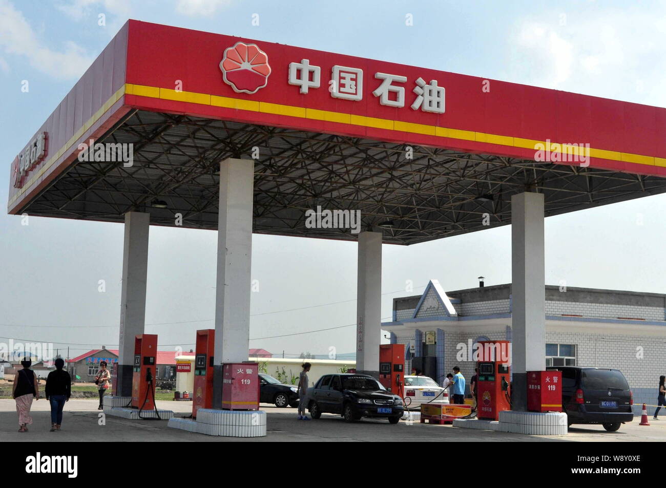 --FILE--Vehicles are being refueled at a gas station of CNPC (China ...
