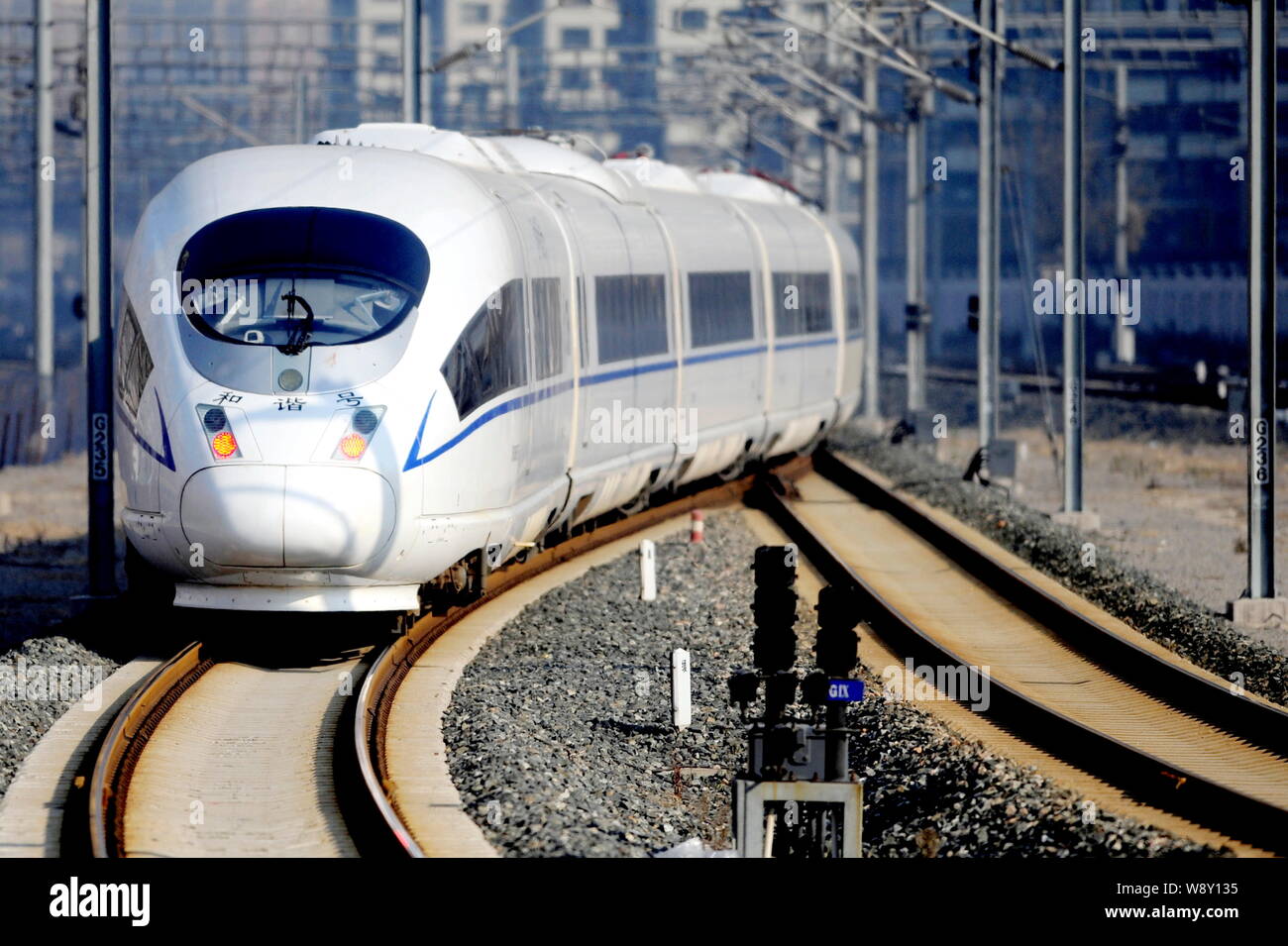--FILE--A CRH (China Railway High-speed) bullet train travels on the ...