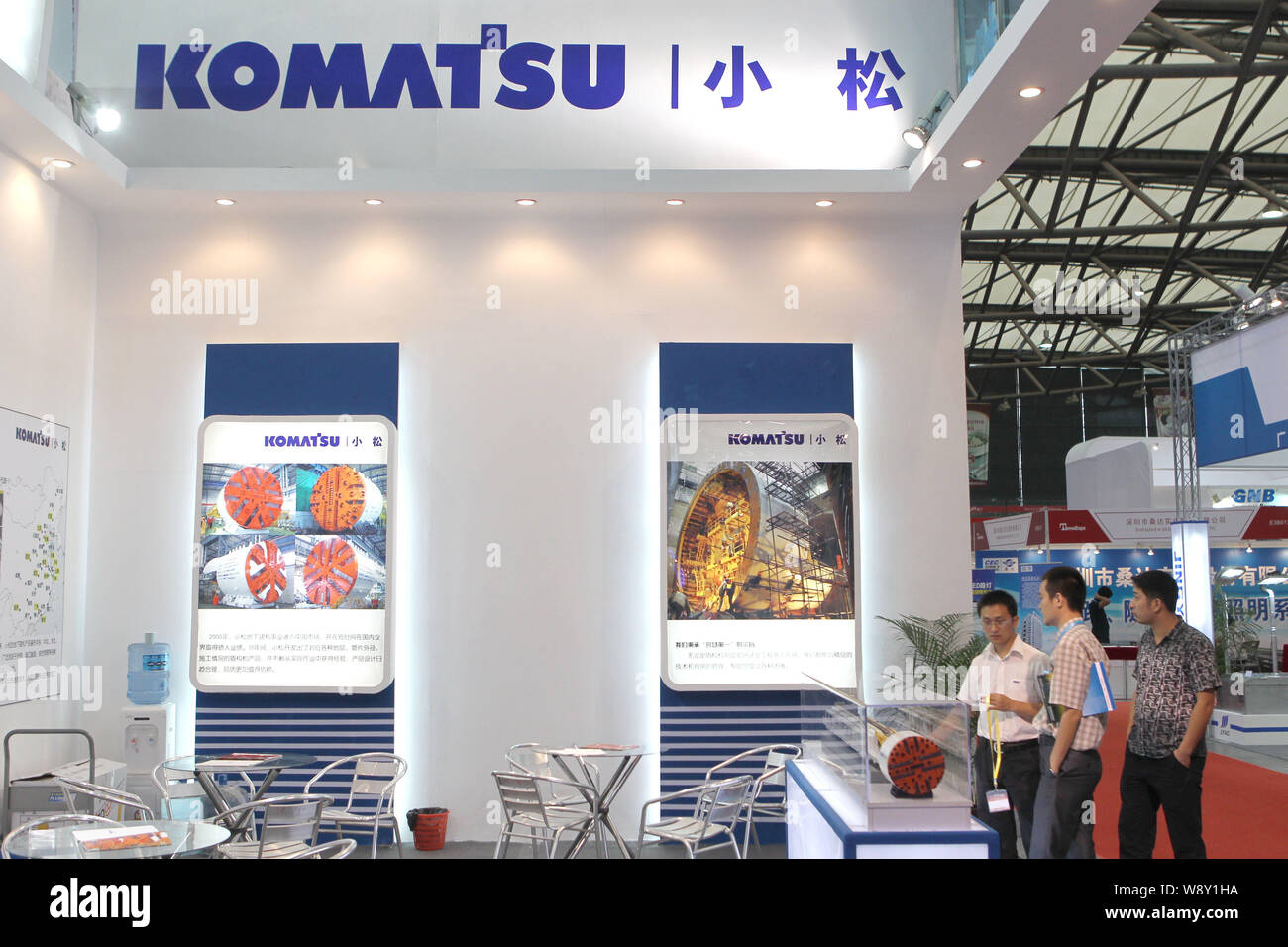 --FILE--People visit the stand of Komatsu Ltd., during an exhibition in ...