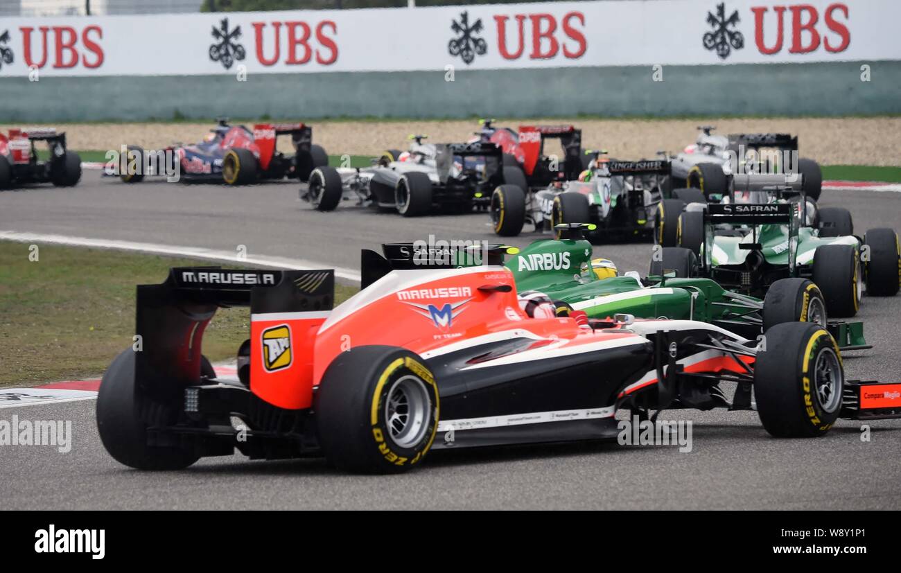 F1 drivers compete during the 2014 Formula 1 Chinese Grand Prix at the ...