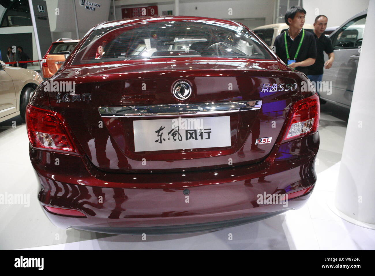 A Dongfeng Fengxing Jingyi S50 sedan is displayed at the stand of ...