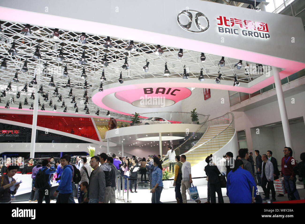 --FILE--People visit the stand of BAIC Group during the 13th Beijing ...